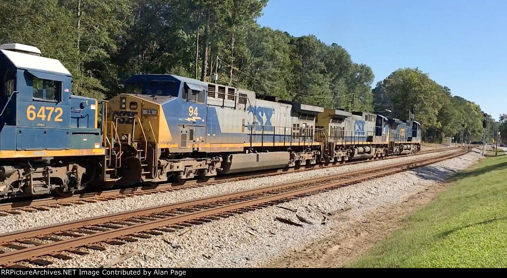 CSX AC44CW 94 runs third in a set of 5 units rolling mixed freight SB